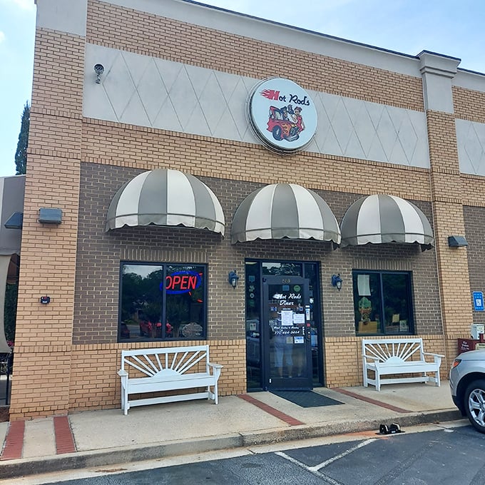 The classic brick exterior with striped awnings isn't trying to be trendy—it's too busy being timeless. Hot Rod's welcomes you like an old friend who's saved you a seat.