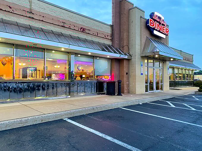 Bathed in the glow of purple neon, Silver Spring Diner's exterior promises the comfort food equivalent of a warm hug on a chilly Pennsylvania morning.