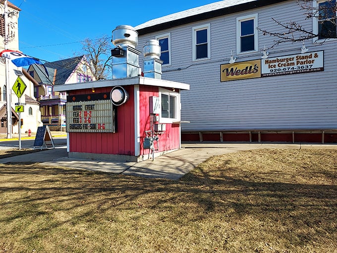 The little red burger stand that could! Wedl's unassuming exterior hides culinary treasures that have Wisconsin locals lining up rain or shine.