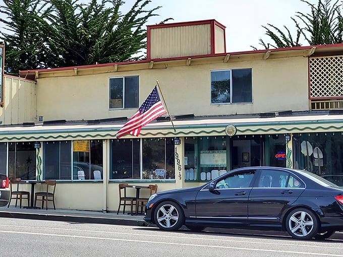 The unassuming exterior of Fishwife belies the culinary treasures within. That American flag isn't just patriotic—it's waving you in for seafood salvation.