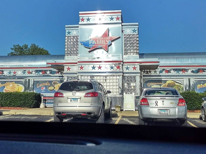 The gleaming chrome exterior of Four Star Family Restaurant stands like a time portal to the 1950s, complete with a constellation of stars that promise stellar dining.