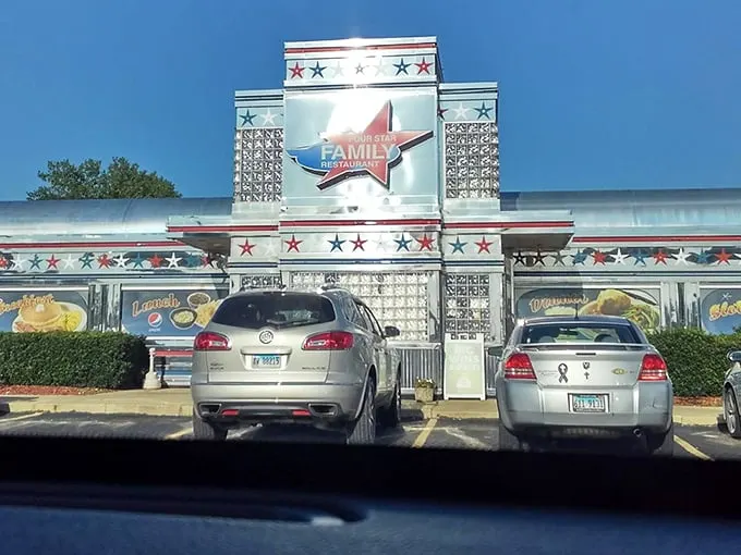 The gleaming chrome exterior of Four Star Family Restaurant stands like a time portal to the 1950s, complete with a constellation of stars that promise stellar dining.