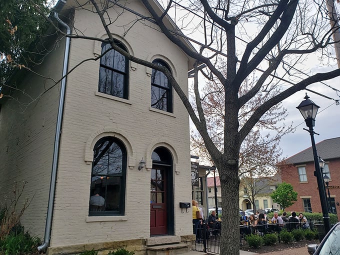 The historic cream-colored building stands like a time capsule in Dublin's historic district, its arched windows and red door promising Irish comfort within.