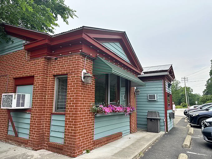 That unassuming brick and teal exterior hides culinary treasures that'll make your taste buds sing opera.