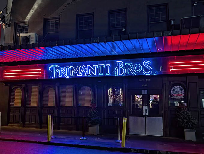 The neon glow of Primanti Bros. beckons hungry night owls like a culinary lighthouse in Pittsburgh's Strip District. Food paradise awaits.