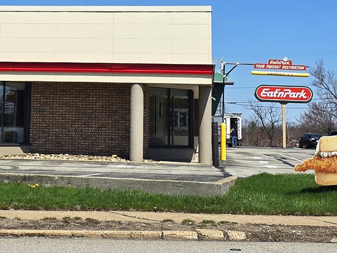 The iconic Eat'n Park sign beckons like an old friend, promising comfort food that's stood the test of time since 1949.