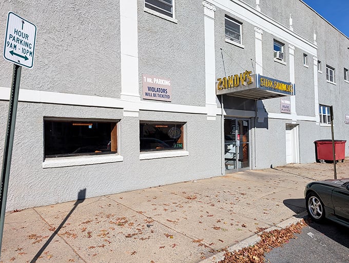 The unassuming gray exterior of Zandy's might not stop traffic, but locals know this modest façade hides Pennsylvania's best-kept cheesesteak secret.