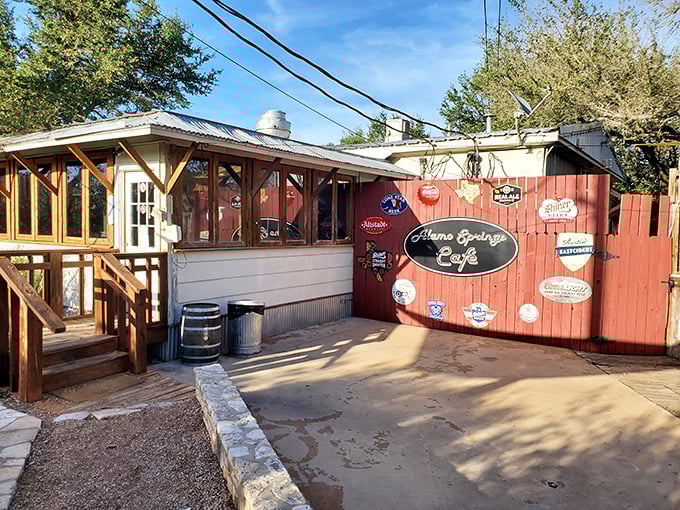 The unassuming red exterior of Alamo Springs Café proves once again that in Texas, the most spectacular food often hides in the most modest packages. 