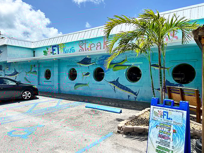 The turquoise facade with nautical portholes isn't just Keys kitsch—it's the universal signal that says, "Leave your pretensions at the door, but bring your appetite."