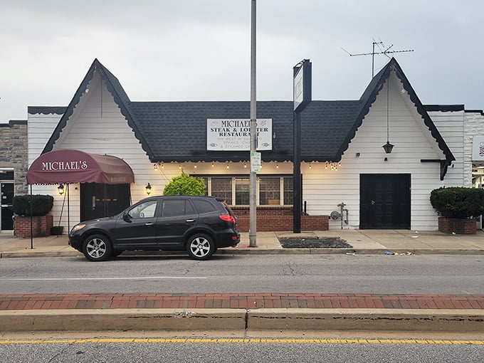 A cottage-like exterior that whispers "nothing fancy here" while hiding Baltimore's worst-kept secret: some of the finest steaks and seafood in Maryland.
