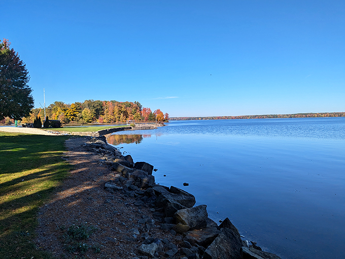 Fall foliage frames the glassy waters of Pymatuning like nature's own masterpiece. Those colors aren't Photoshopped—they're Pennsylvania showing off.