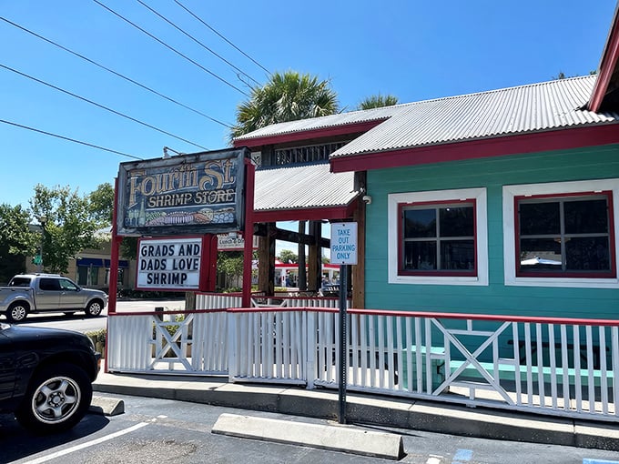 That cheerful green and red exterior might look humble, but it's hiding some serious seafood magic inside.