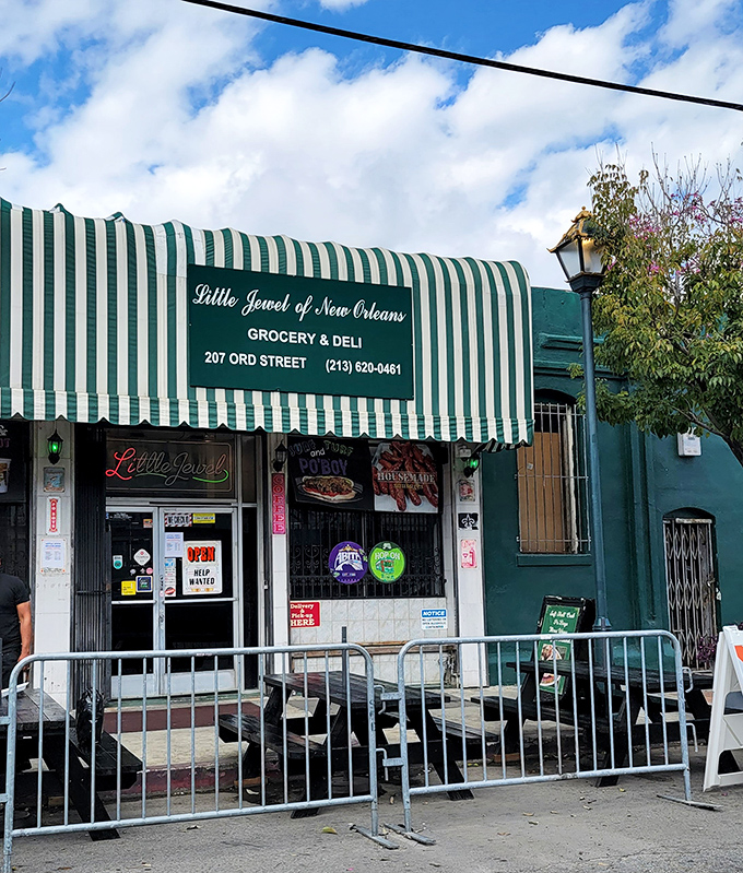 The green and white striped awning of Little Jewel stands out in Chinatown like a Saints fan at a Rams game. A culinary portal to New Orleans hiding in plain sight.