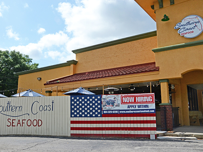 The patriotic fence says it all – this unassuming yellow stucco building houses seafood treasures that would make Neptune himself jealous.