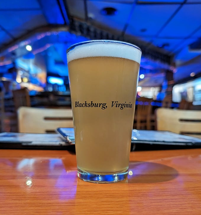 A perfect pour of Blacksburg pride – this golden elixir isn't just beer, it's liquid sunshine with a frothy crown of possibilities.