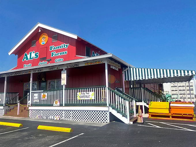 Al's Family Farms stands as a cheerful red beacon of agricultural tradition, where "fresh" isn't just marketing – it's the only way they operate.