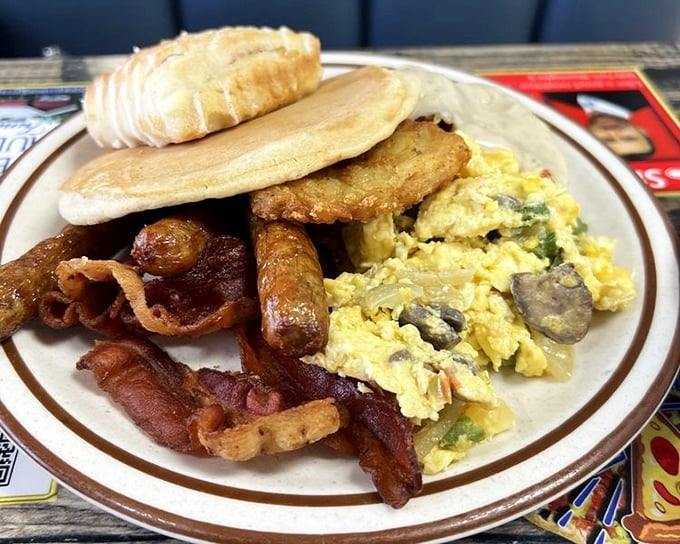 The breakfast platter that answers all your morning prayers—eggs, bacon, sausage, pancakes, and a side of nostalgia.
