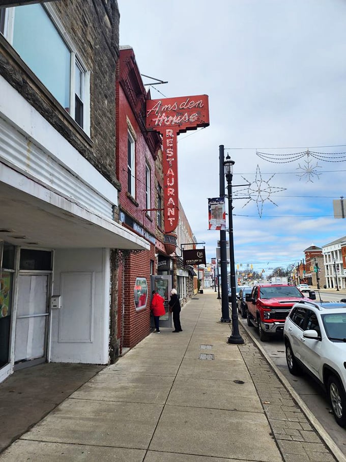 The Amsden House Restaurant's vintage neon sign doesn't just advertise food—it broadcasts a beacon of comfort to hungry souls wandering Main Street.