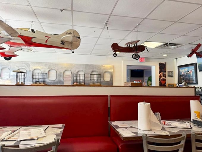 The aviation theme continues with model planes suspended from the ceiling—your taste buds will be flying too.