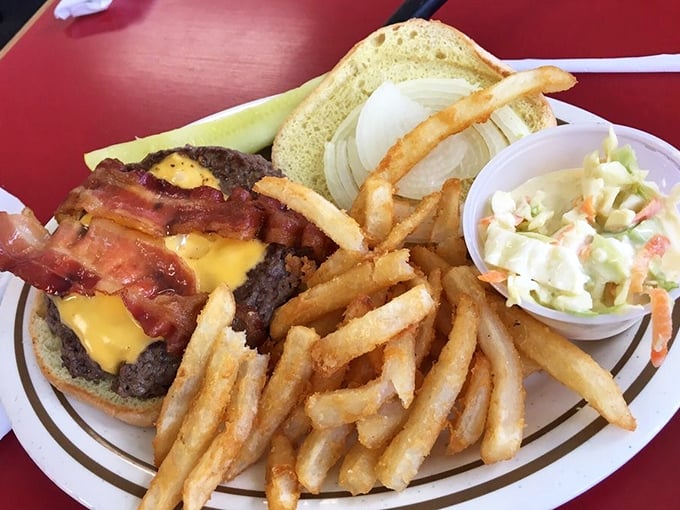 This isn't just a burger – it's architecture with cheese, a monument to American ingenuity with bacon as the crowning achievement.