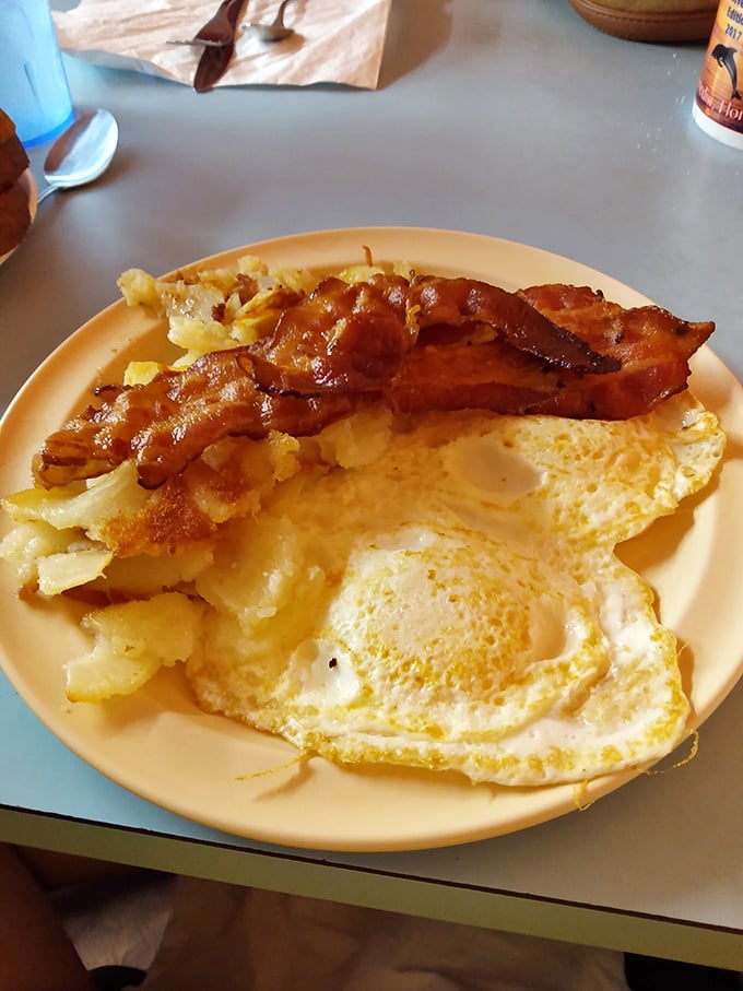 Crispy bacon, sunny eggs, and golden hash browns—the breakfast trinity that's converted more night owls into morning people than alarm clocks ever could.