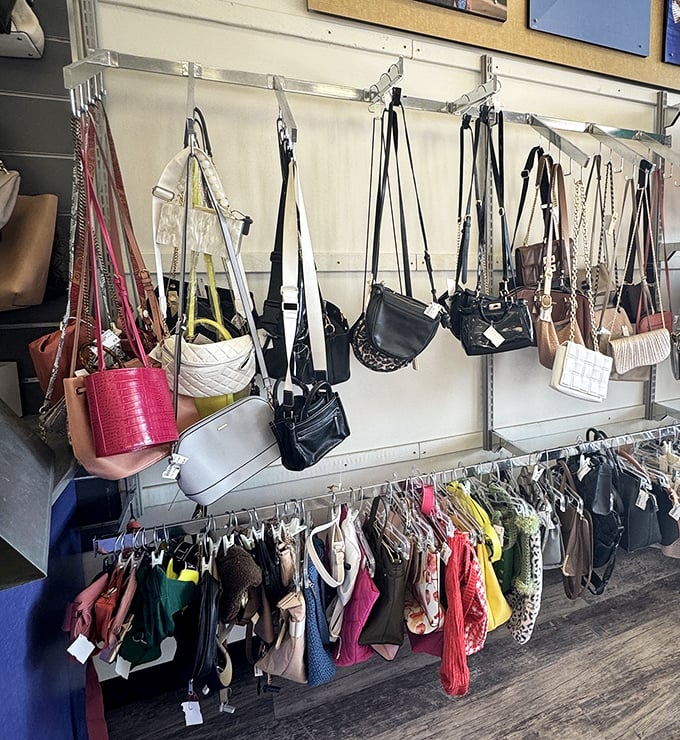 Handbag heaven hanging in plain sight. That designer purse you've been eyeing online? Its cousin might be waiting here for a fraction of the price.