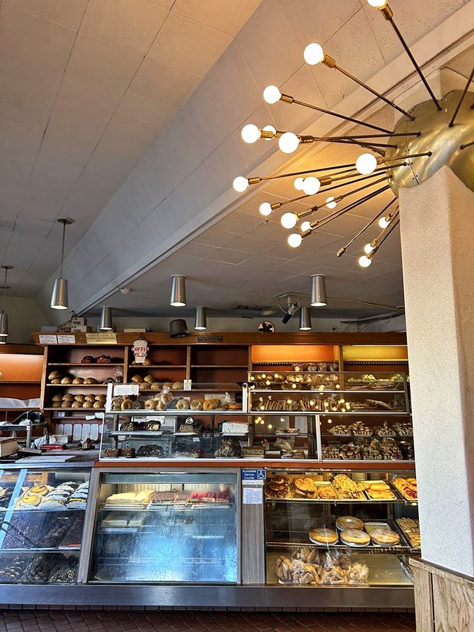 The bakery display that's launched a thousand diet cheat days. These pastries have witnessed more "just this once" promises than a Vegas chapel.