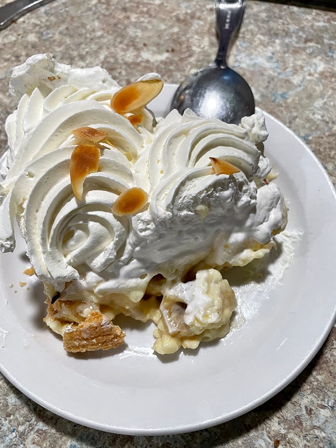 This isn't just whipped cream—it's a cloud that decided to vacation on a slice of heaven. Banana cream pie that would make your grandmother both proud and jealous.