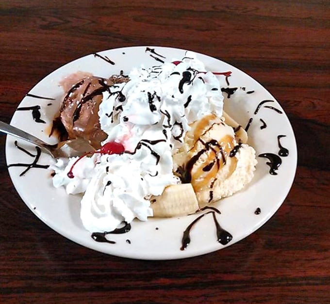 This banana split doesn't care about your diet plans—it's a monument to the philosophy that dessert is always a good idea.