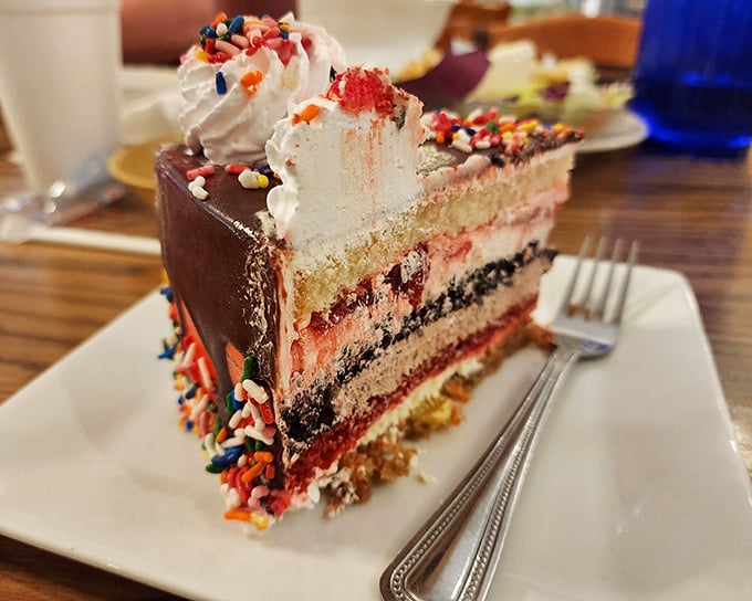 Layer upon layer of sweet indulgence that makes counting calories seem like a crime against humanity. This cake doesn't just satisfy—it celebrates.