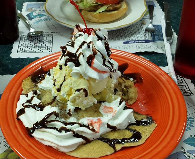 Dessert masquerading as breakfast? Genius! This mountain of whipped cream, chocolate, and what appears to be banana creates beautiful morning decadence.