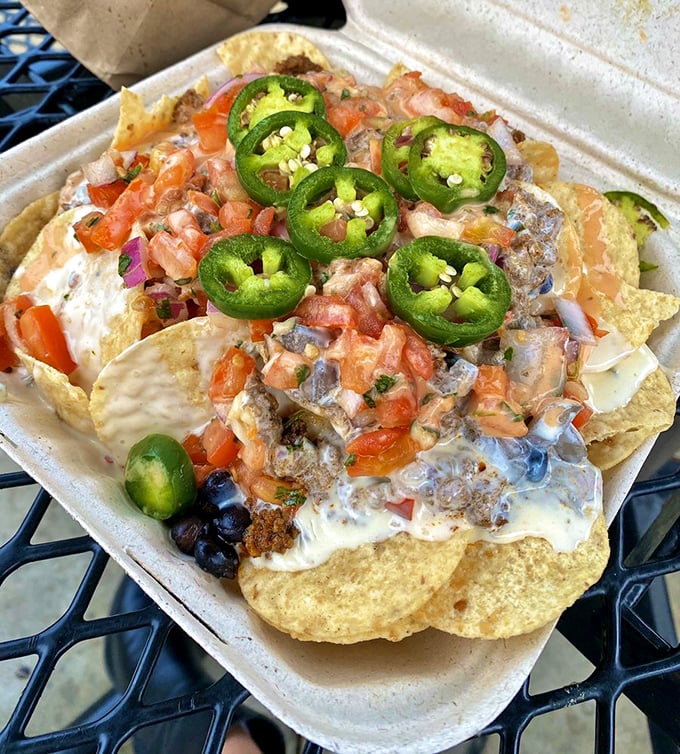 Nachos that don't skimp on the good stuff – each chip a delivery vehicle for maximum flavor and those jalapeños mean business.