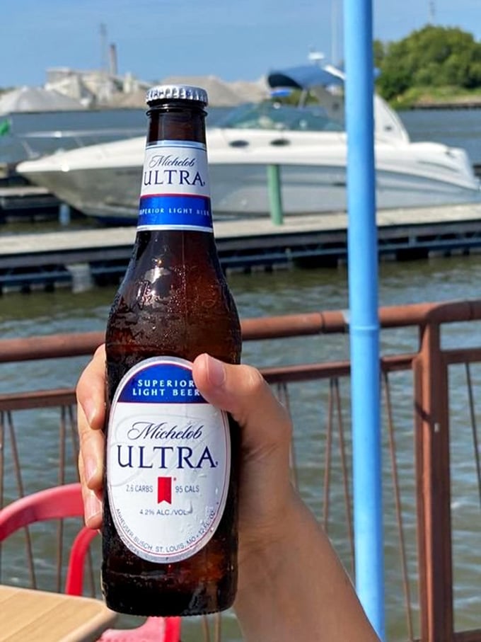 Cold beer with a water view – the perfect pairing for seafood and sunshine at Pickle Bill's riverside perch.