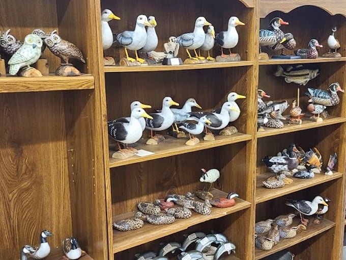 These carved bird figurines perch eternally, bringing nature's beauty indoors without the morning wake-up calls.