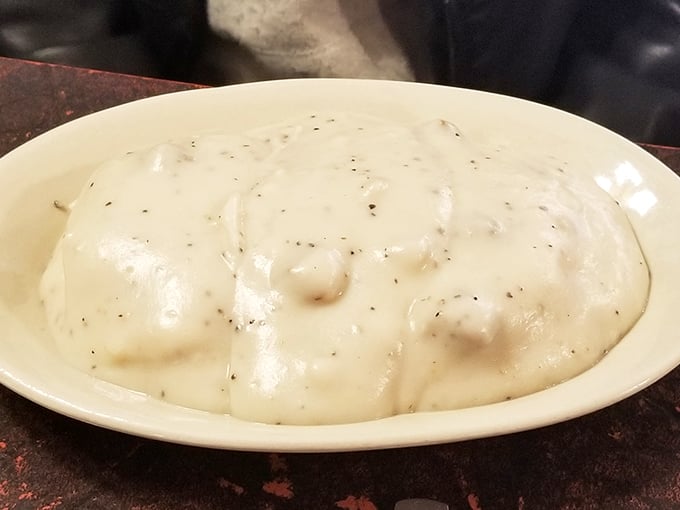 Biscuits and gravy – the comfort food equivalent of a warm hug from your favorite grandparent, smothered in peppery white gravy goodness.