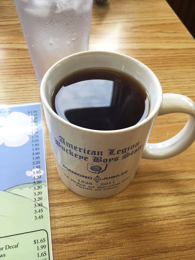 The elixir of morning life, served in a mug that's seen thousands of Ohio dawns. Coffee here isn't just a beverage—it's a ritual.