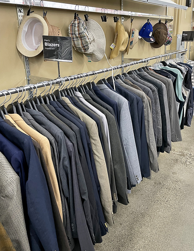 Men's blazers and hats line up like job candidates—some distinguished veterans, others barely worn rookies, all ready for their interview.