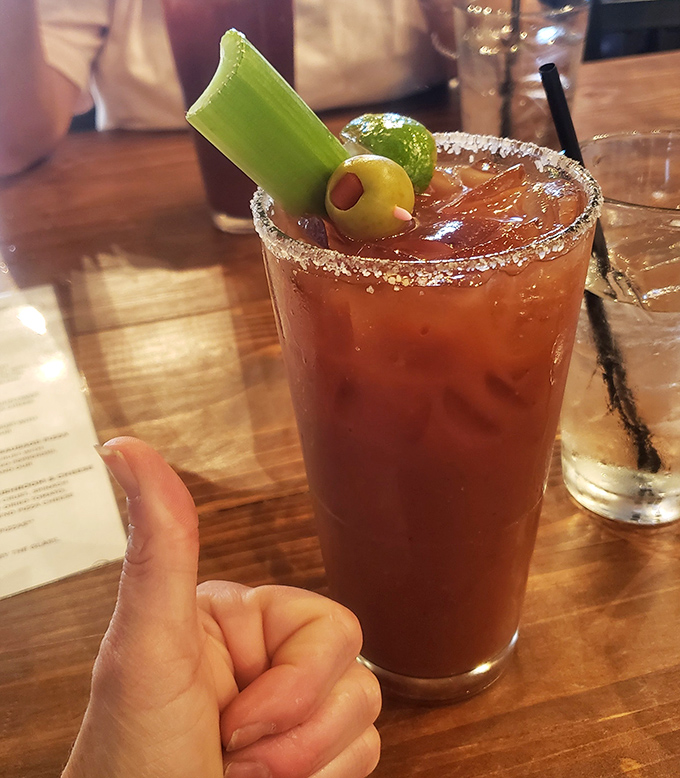 This isn't just a Bloody Mary – it's a spicy liquid brunch accessory complete with the perfect garnish trifecta of celery, olive, and lime.