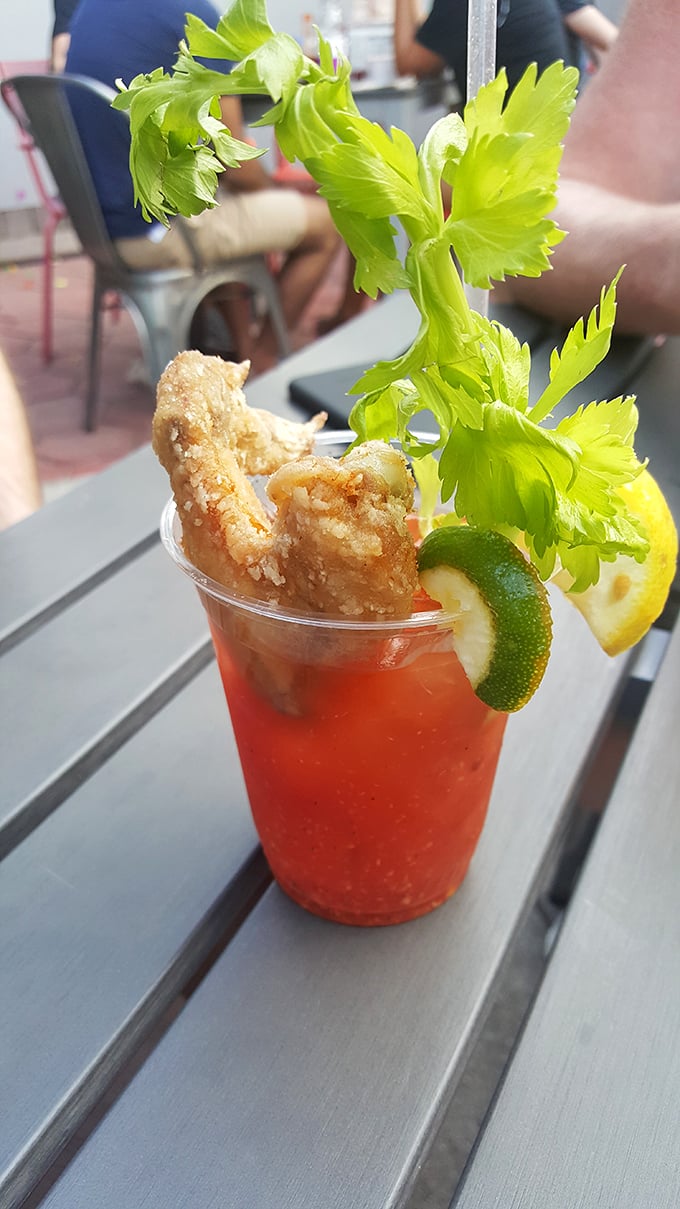 The Bloody Mary comes with its own chicken garnish—because why should celery have all the fun in cocktail accessories?