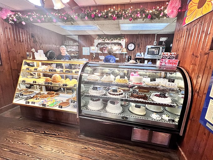 The bakery case—where diet plans go to die and "I'll just have a small piece" becomes the lie you tell yourself.