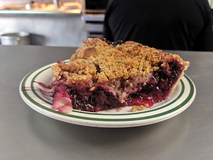 Berry crumble pie that's both sweet and tart—with a buttery streusel topping that provides the perfect textural contrast to the juicy fruit beneath.