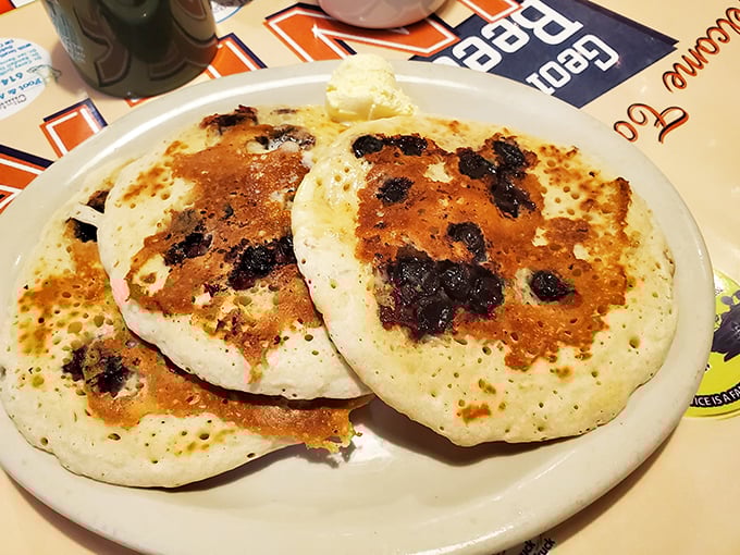 Blueberry pancakes with perfect golden edges and bursts of fruit—the kind that make you forget about every health food trend.