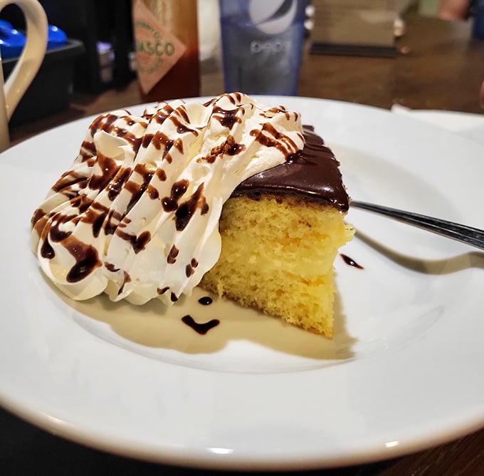 Boston Cream Pie that would make Massachusetts jealous. That chocolate ganache and pillowy cream are having the dessert equivalent of a group hug.