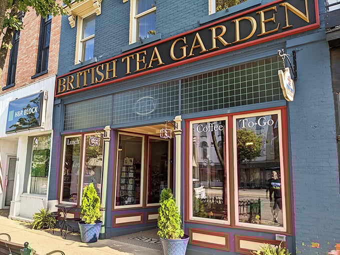 The British Tea Garden's royal blue facade promises a proper cuppa and scones that would make Mary Berry herself nod in approval.