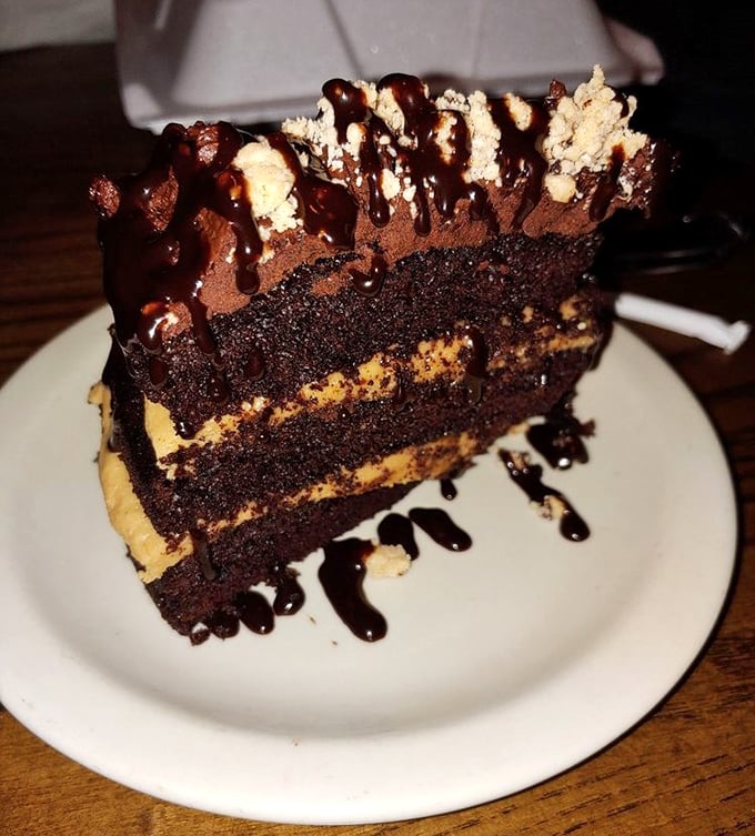 This chocolate cake isn't just dessert; it's an architectural achievement of cocoa, cream, and calories that's worth every delicious bite.
