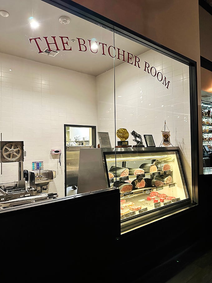 The Butcher Room showcases premium cuts like a museum of marbling - where beef selection becomes an educational experience.