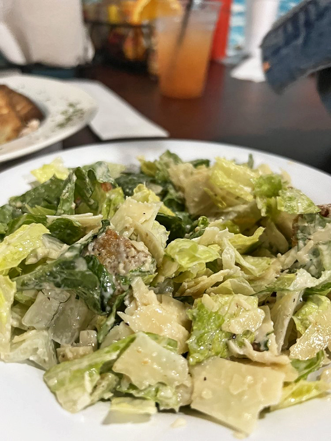 A Caesar salad that knows its role—the supporting actor that deserves its own award for balancing out a seafood feast.