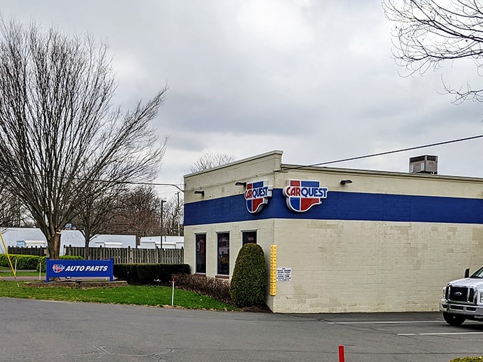 Even the auto parts store maintains Doylestown's dignified aesthetic – proof that function and form can coexist in perfect small-town harmony.