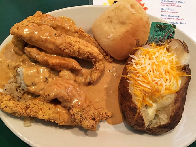 Catfish gets the royal treatment with a loaded baked potato sidekick—a plate that says "Yes, inland seafood can absolutely be this good."