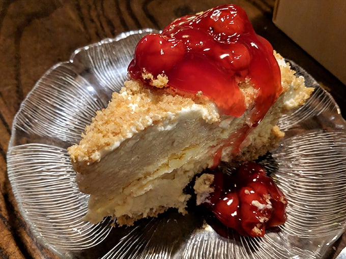 A slice of heaven topped with cherry bliss—proof that saving room for dessert is always the right decision.